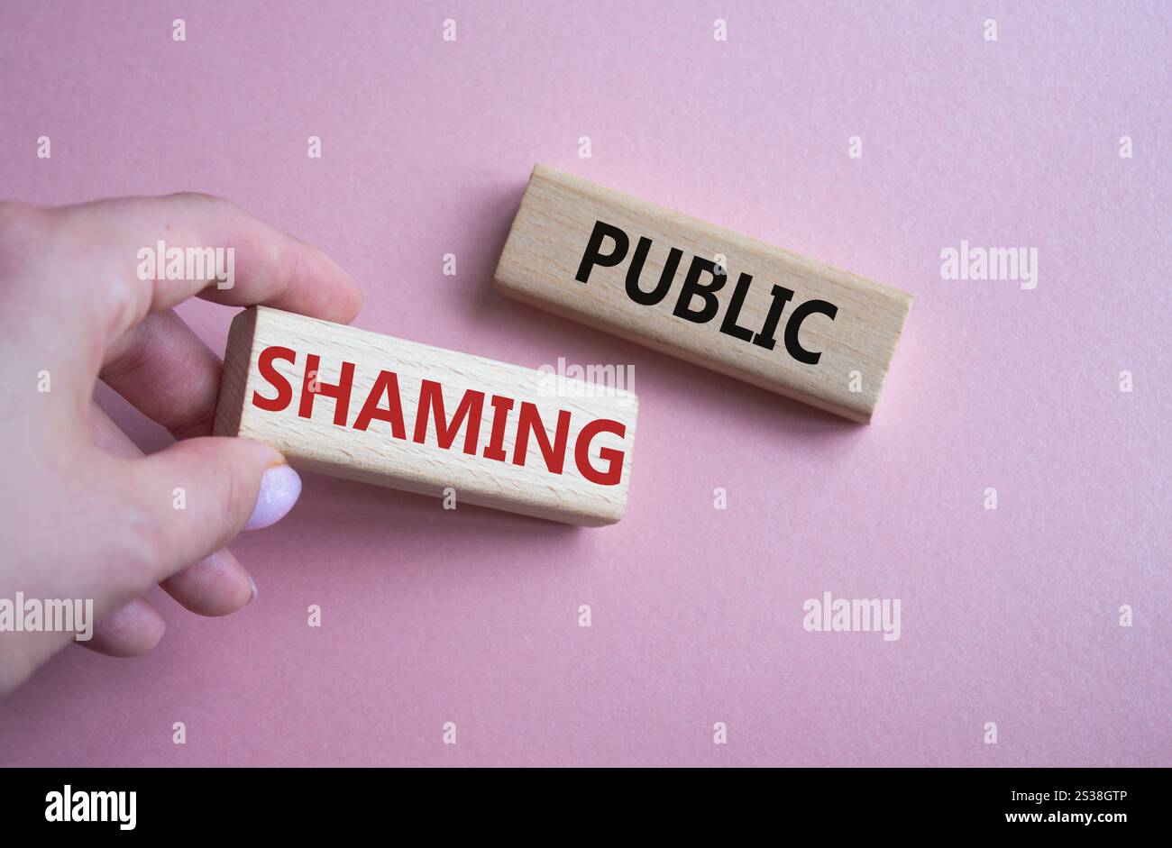 Public Shaming symbol. Concept word Public Shaming on wooden blocks ...