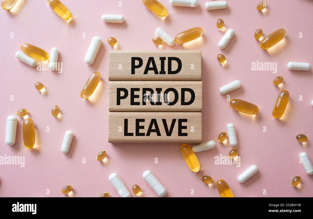 Paid Period Leave symbol. Concept words Paid Period Leave on wooden ...
