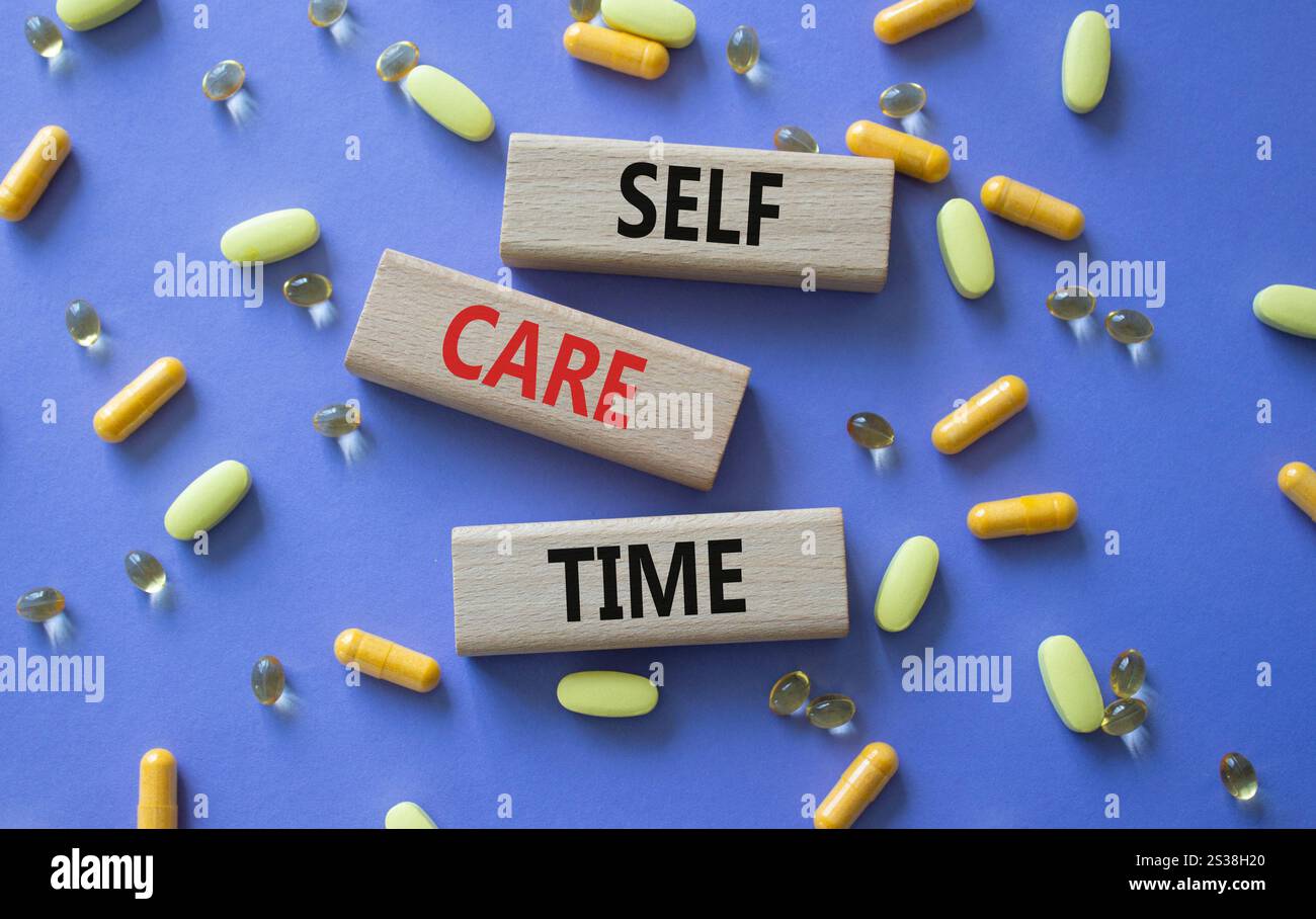 Self-care Time symbol. Concept words Self-care Time on wooden blocks ...