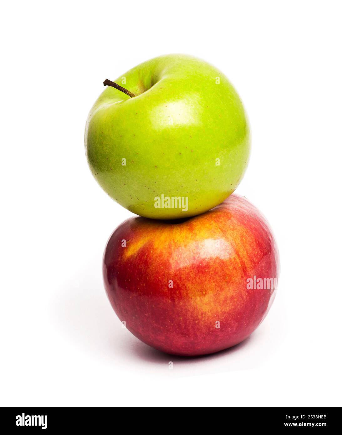Two apples, Red Delicious and Granny Smith, isolated on white ...