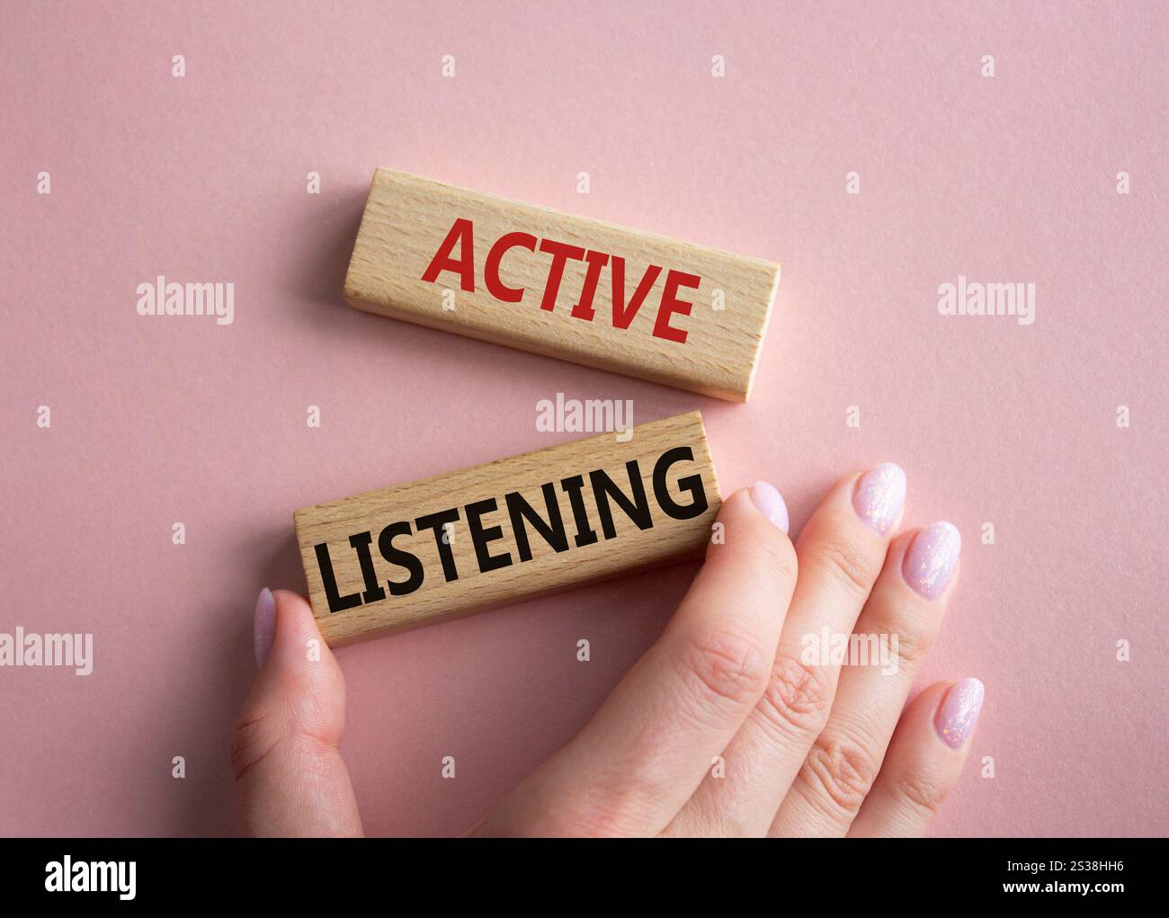 Active listening symbol. Wooden blocks with words Active listening ...