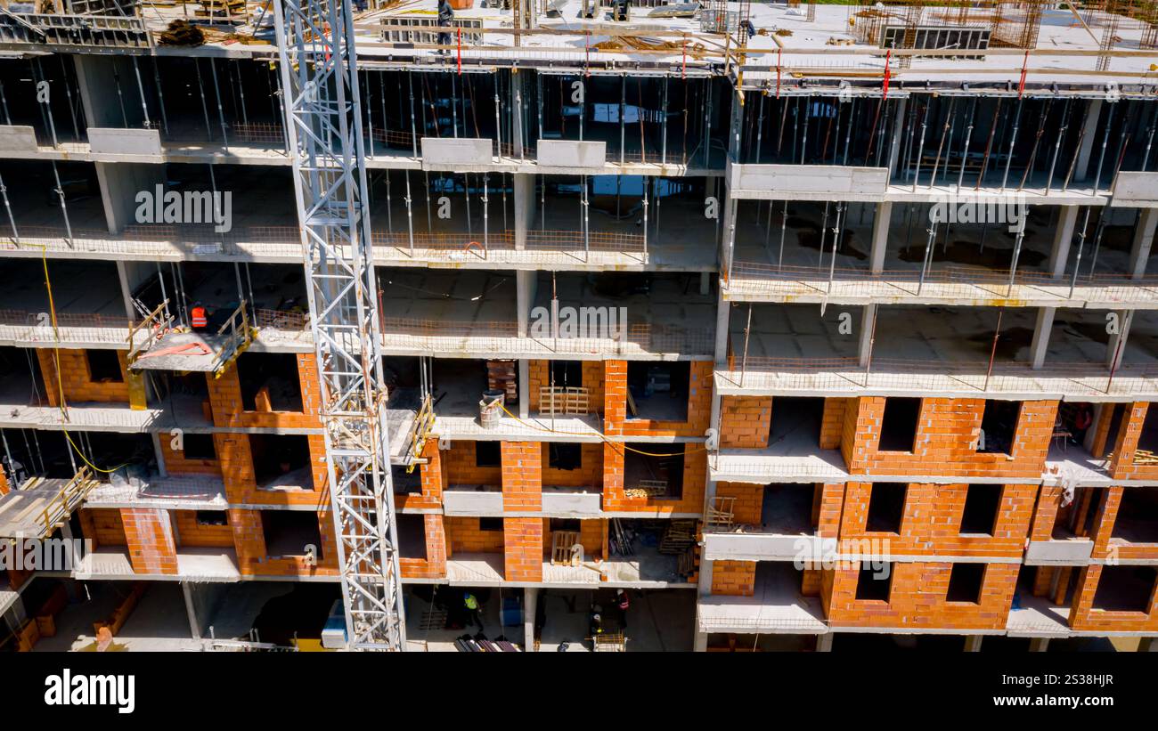 Above view on concrete skeleton of new unfinished multi-storey building ...