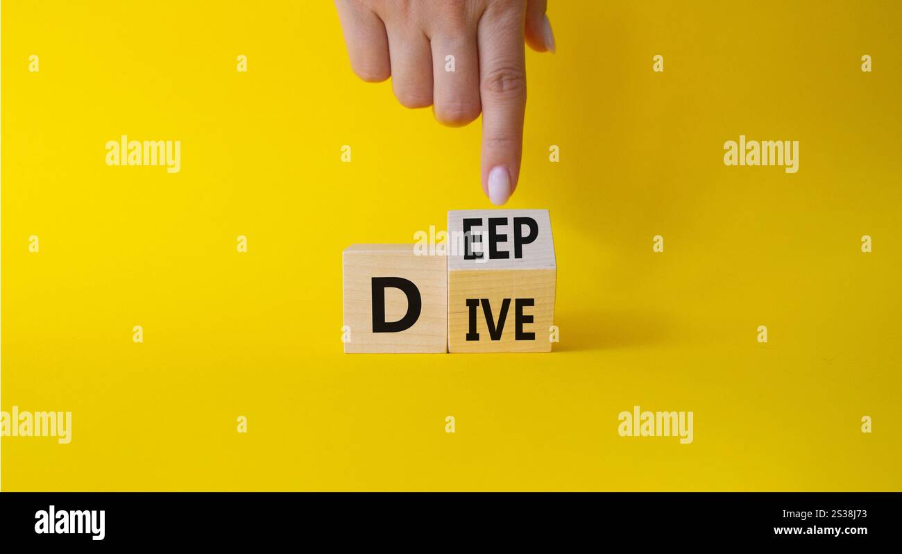 Deep Dive symbol. Businessman hand. Concept words deep dive on wooden ...