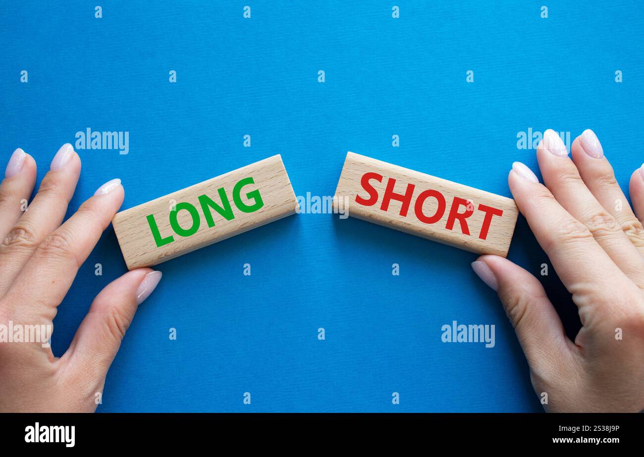 Short vs Long symbol. Concept word Short vs Long on wooden blocks ...