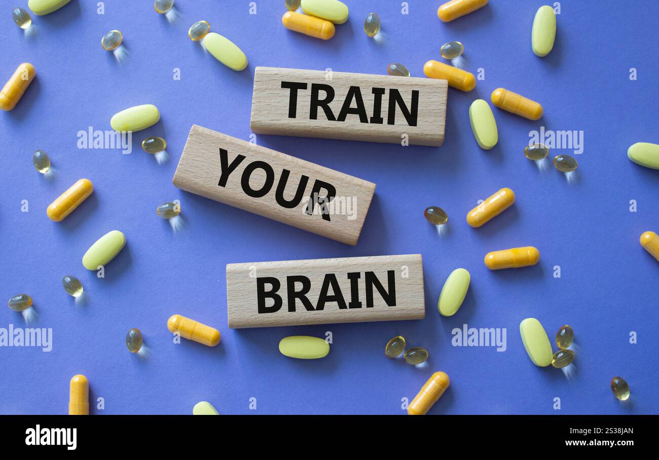 Train Your Brain symbol. Concept words Train Your Brain on wooden ...