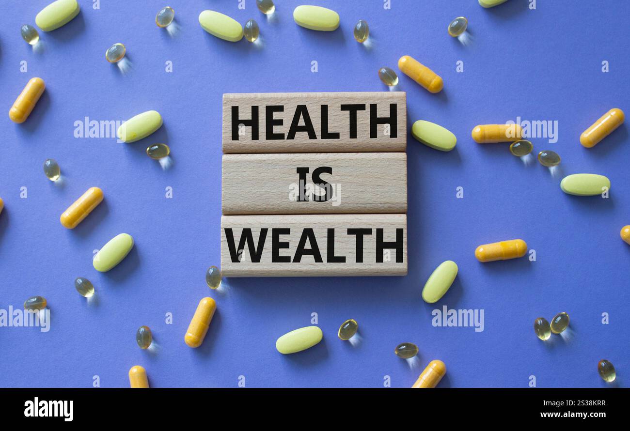 Health is Wealth symbol. Concept word Health is Wealth on wooden blocks ...
