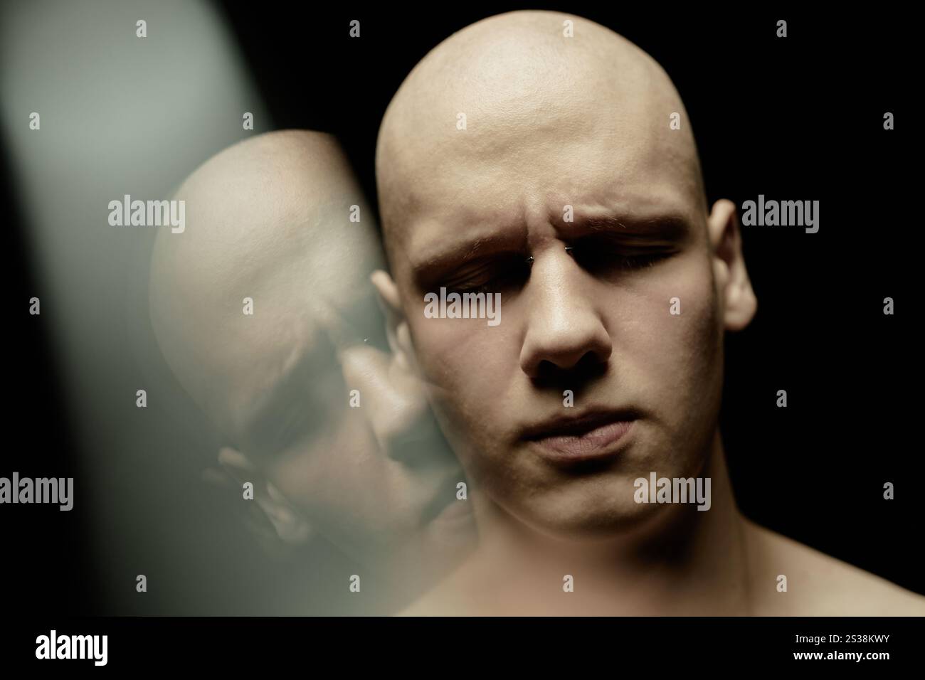 Close up of frowning bald man experiencing intense feeling of anxiety ...