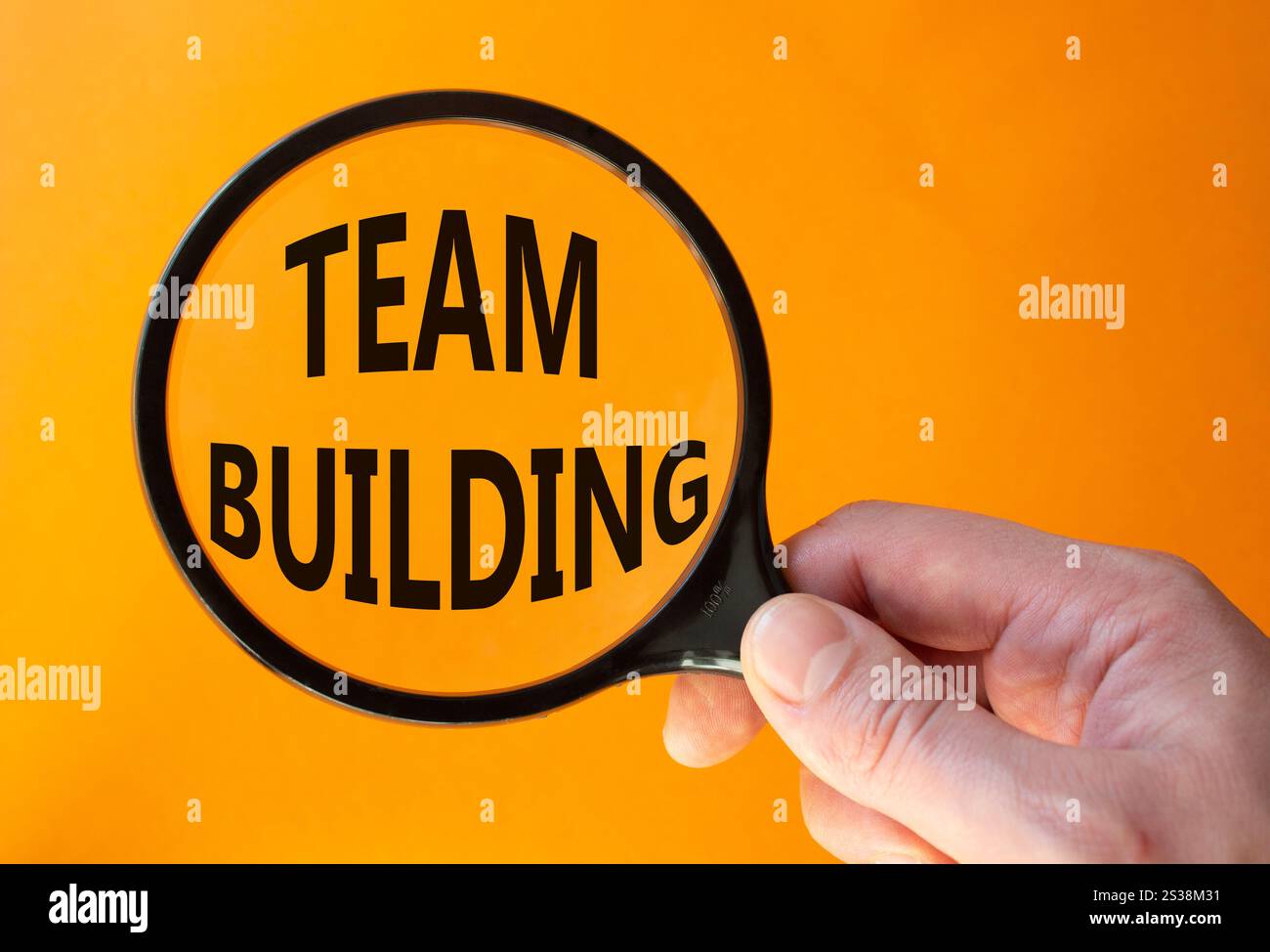 Team Building symbol. Concept word Team Building on magnifying glass ...