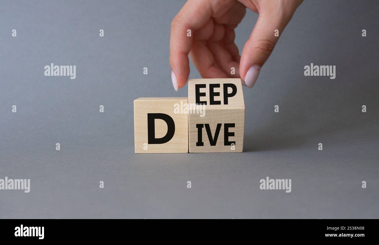 Deep Dive symbol. Businessman hand. Concept words deep dive on wooden ...
