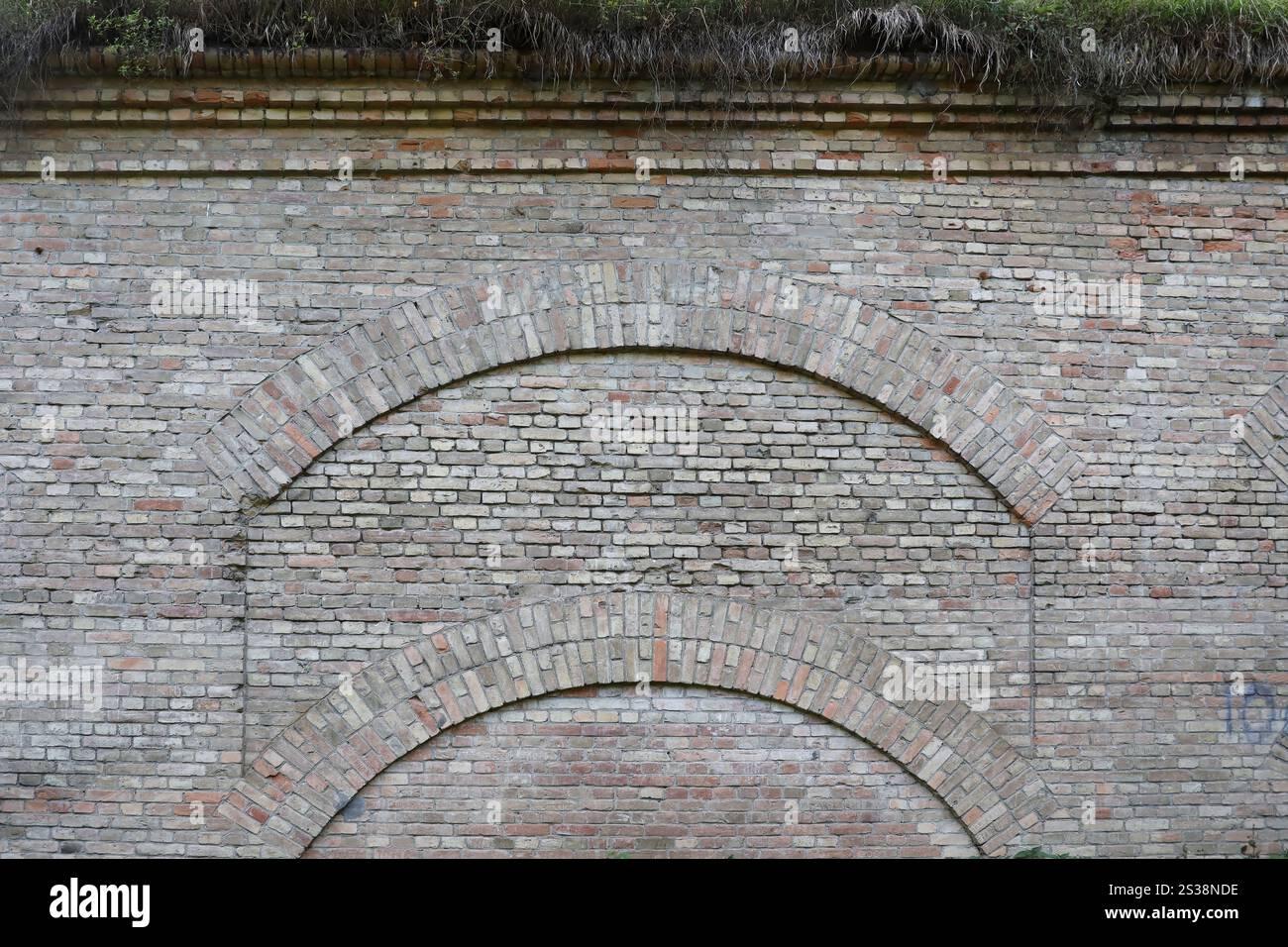 Very old brick stone wall of castle or fortress of 18th century. Full ...