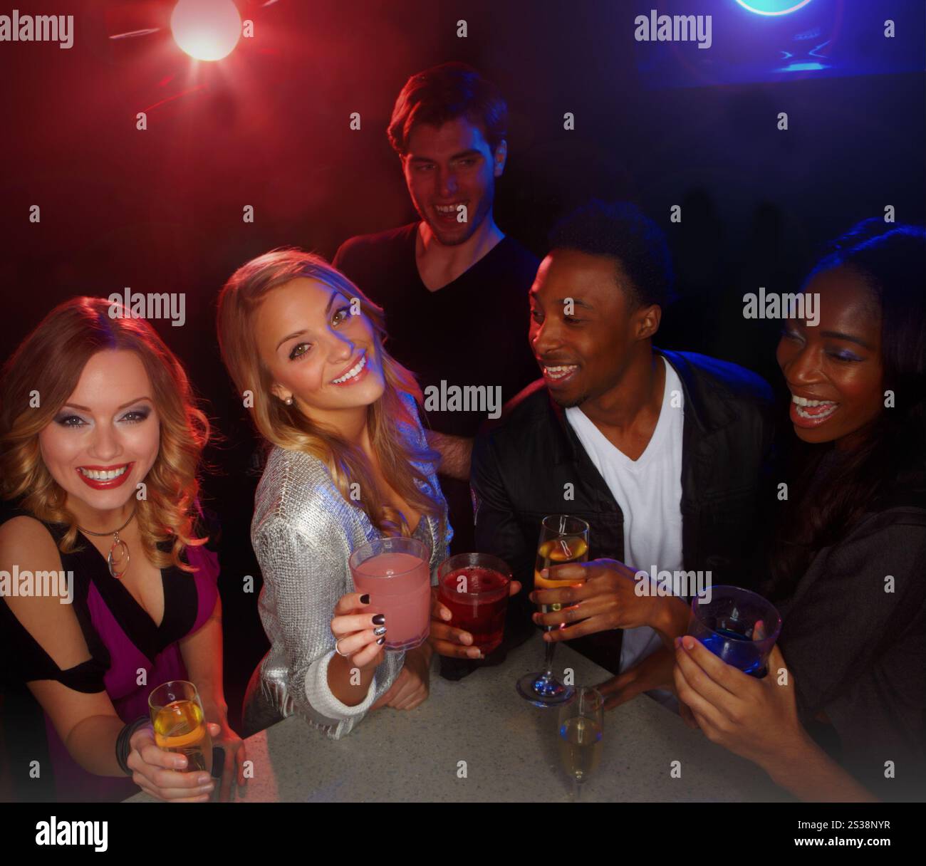 Cheers, portrait and friends with alcohol in nightclub for fun ...