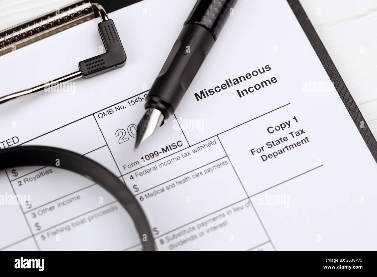 IRS Form 1099-misc Miscellaneous income blank on A4 tablet lies on ...