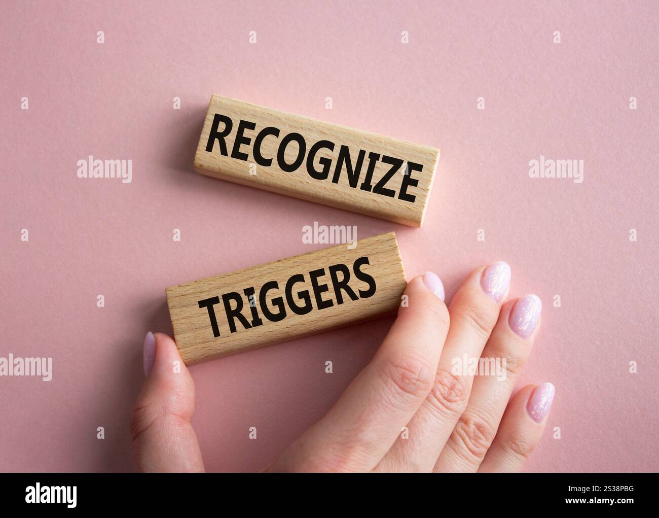 Recognize triggers symbol. Concept words Recognize triggers on wooden ...