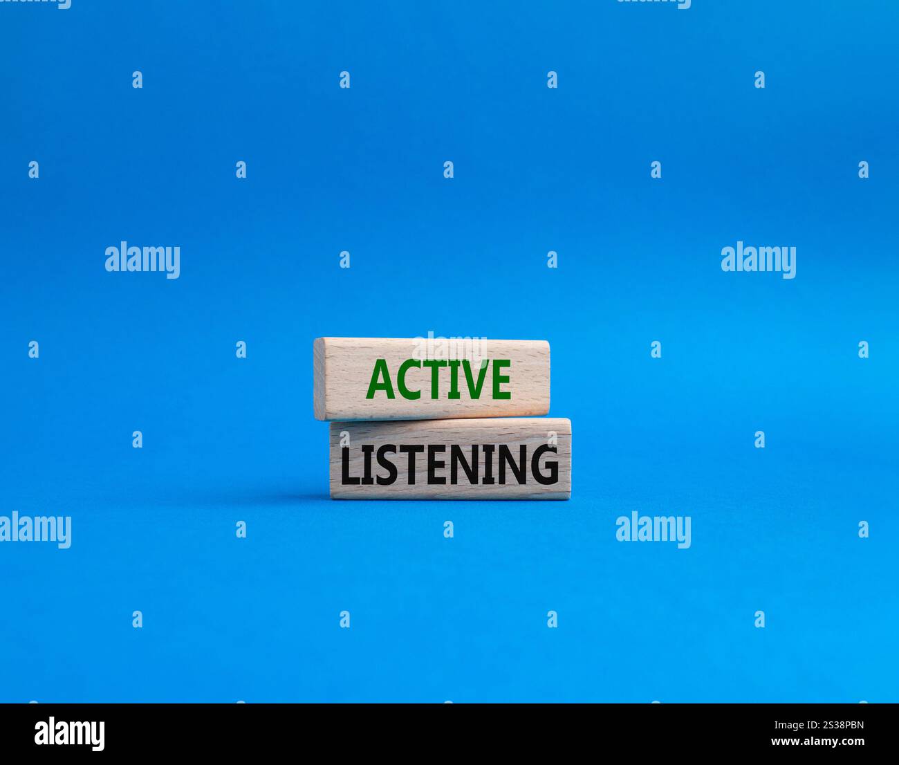 Active listening symbol. Wooden blocks with words Active listening ...