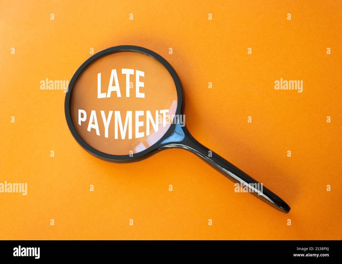 Late payment symbol. Concept word Late payment on magnifying glass ...