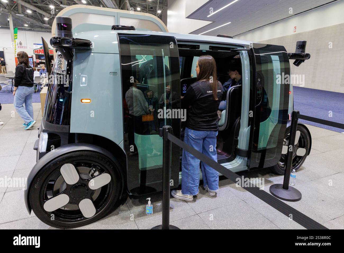 An all-electric, fully autonomous ride-hail vehicle on display by Zoox ...