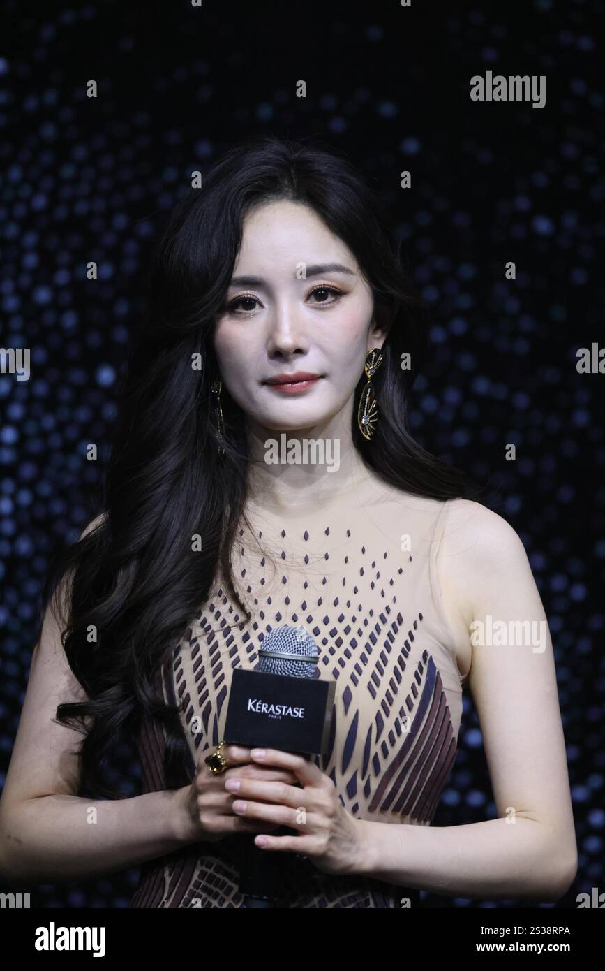 Chinese actress and singer Yang Mi attends an activity in Shanghai ...