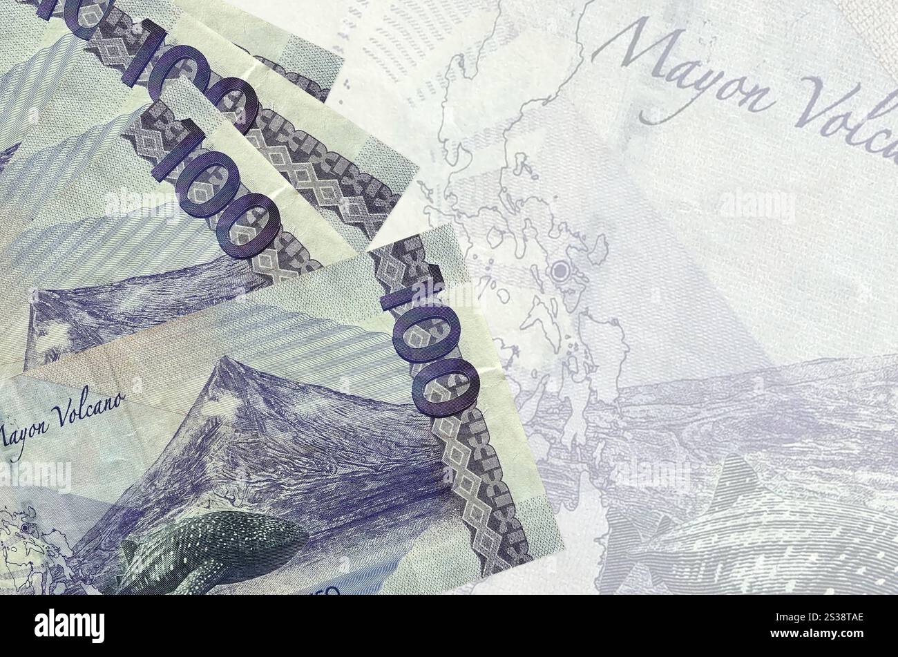 100 Philippine piso bills lies in stack on background of big semi ...