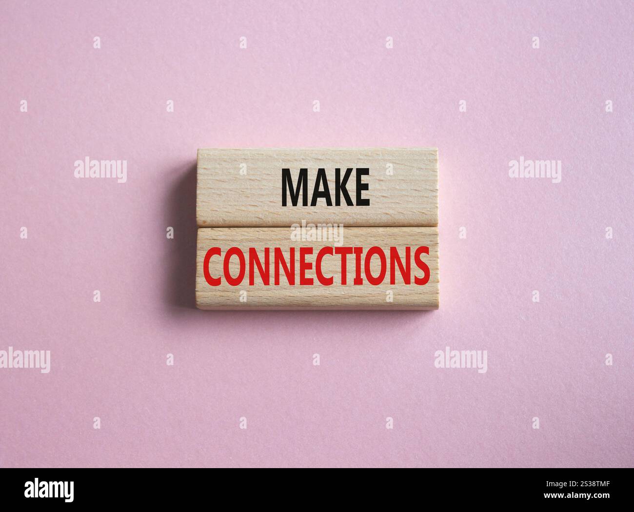 Make Connections symbol. Concept word Make Connections on wooden blocks ...