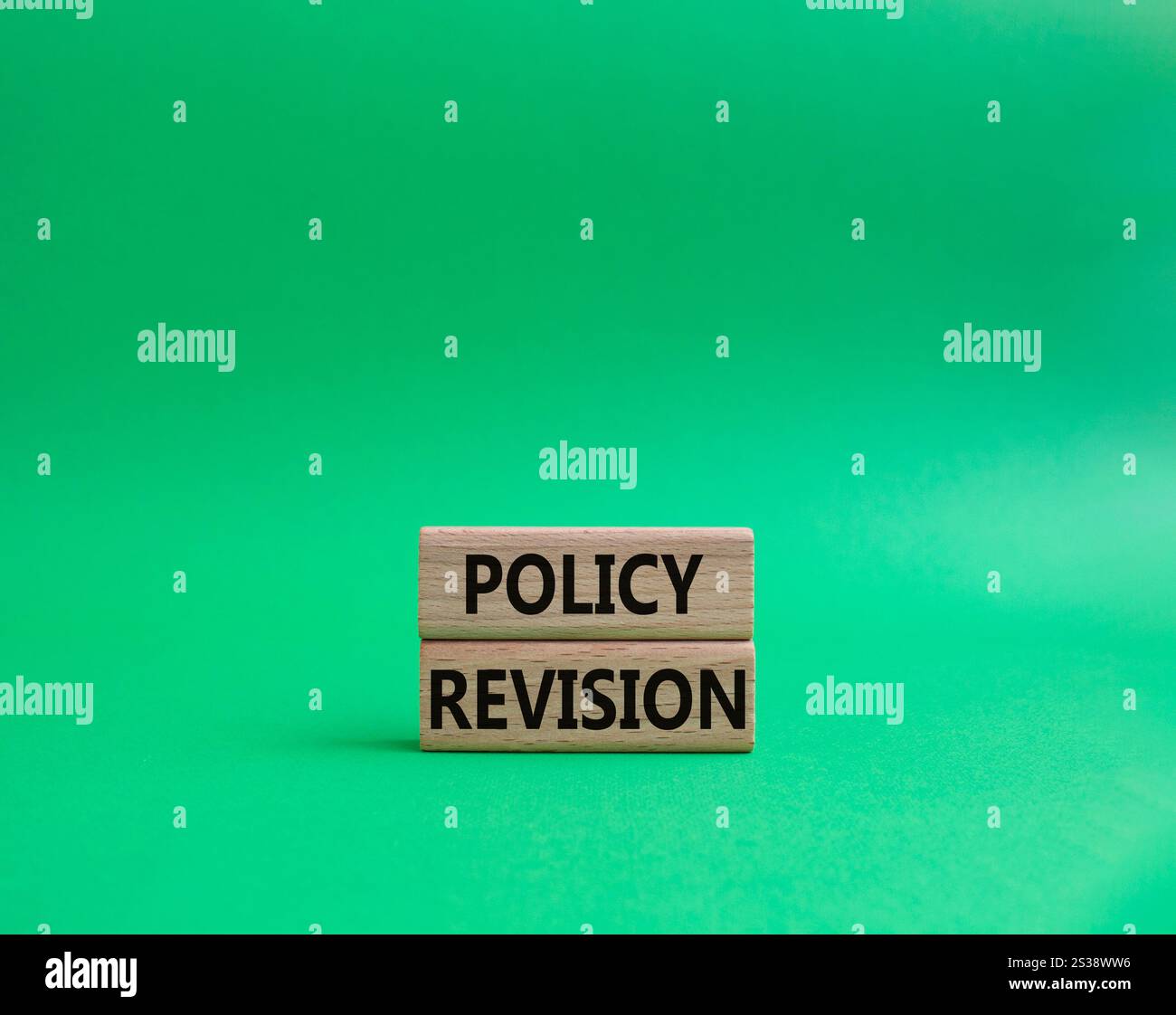 Policy revision symbol. Concept word Policy revision on wooden blocks ...