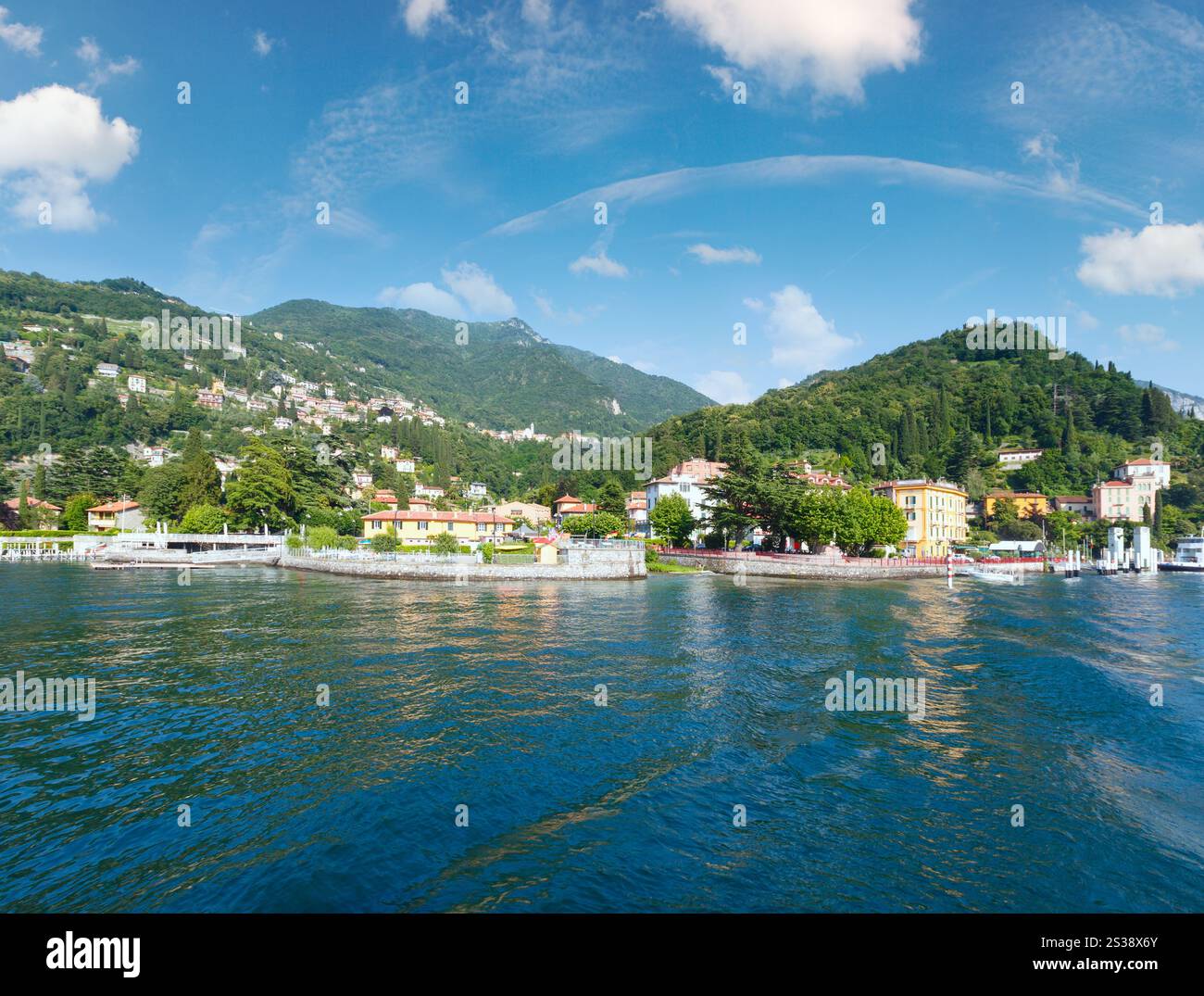 Town on Lake Como coast (Italy). Summer view from ship board Stock ...