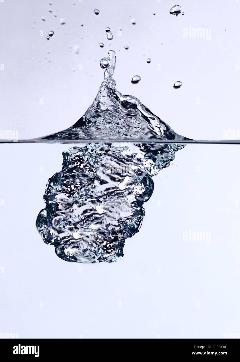 High speed photography captures a clear splash of water hi-res stock ...