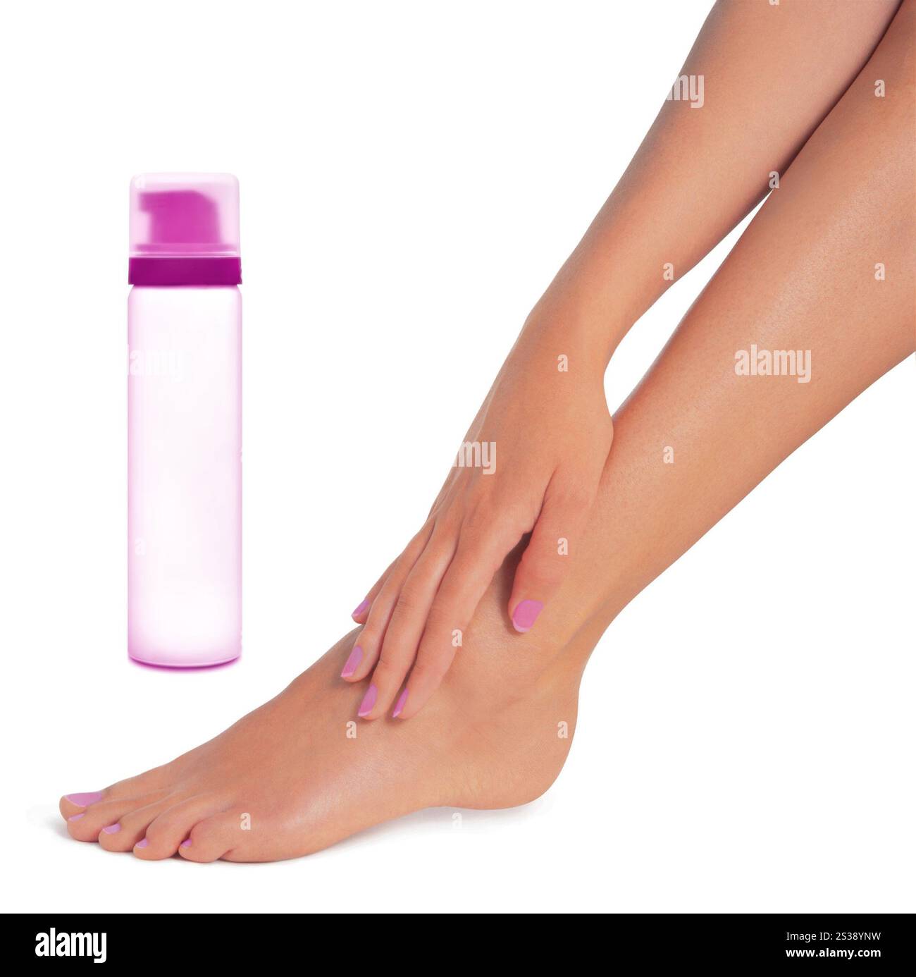 Perfectly manicured hands applying moisturizer onto legs beside a ...