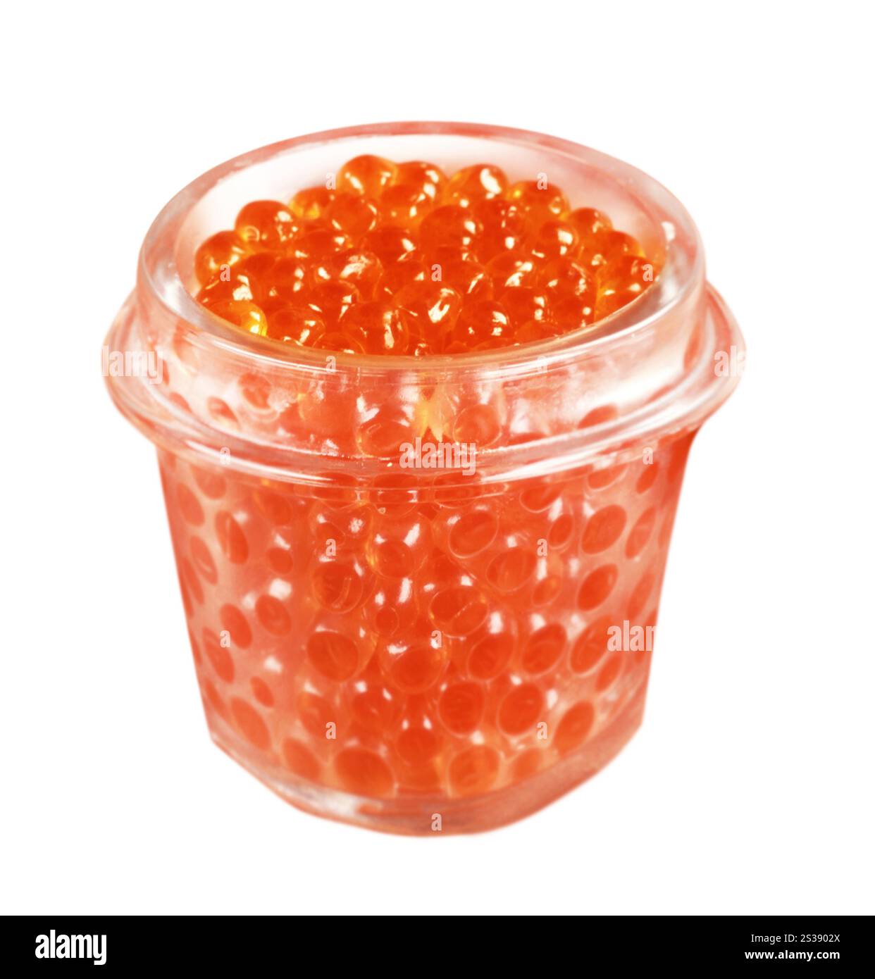 Bright orange salmon roe, also known as ikura, displayed in a clear ...