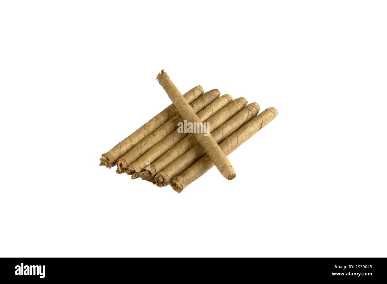 Stack of premium hand-rolled cigars isolated on a white background ...