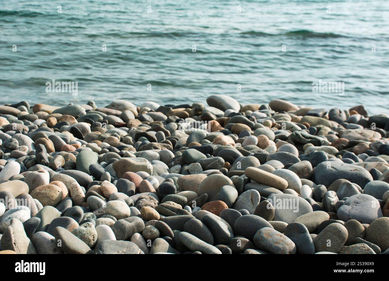 colorful stone on the beach Stock Photo - Alamy