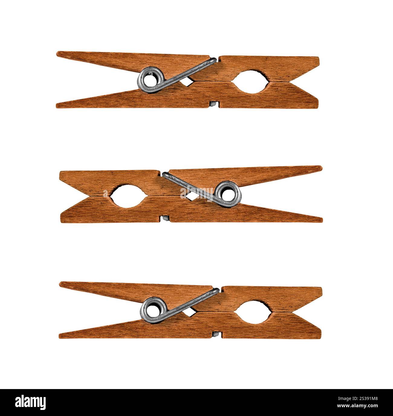 old wooden clothes pins on a white. old wooden clothes pins Stock Photo ...