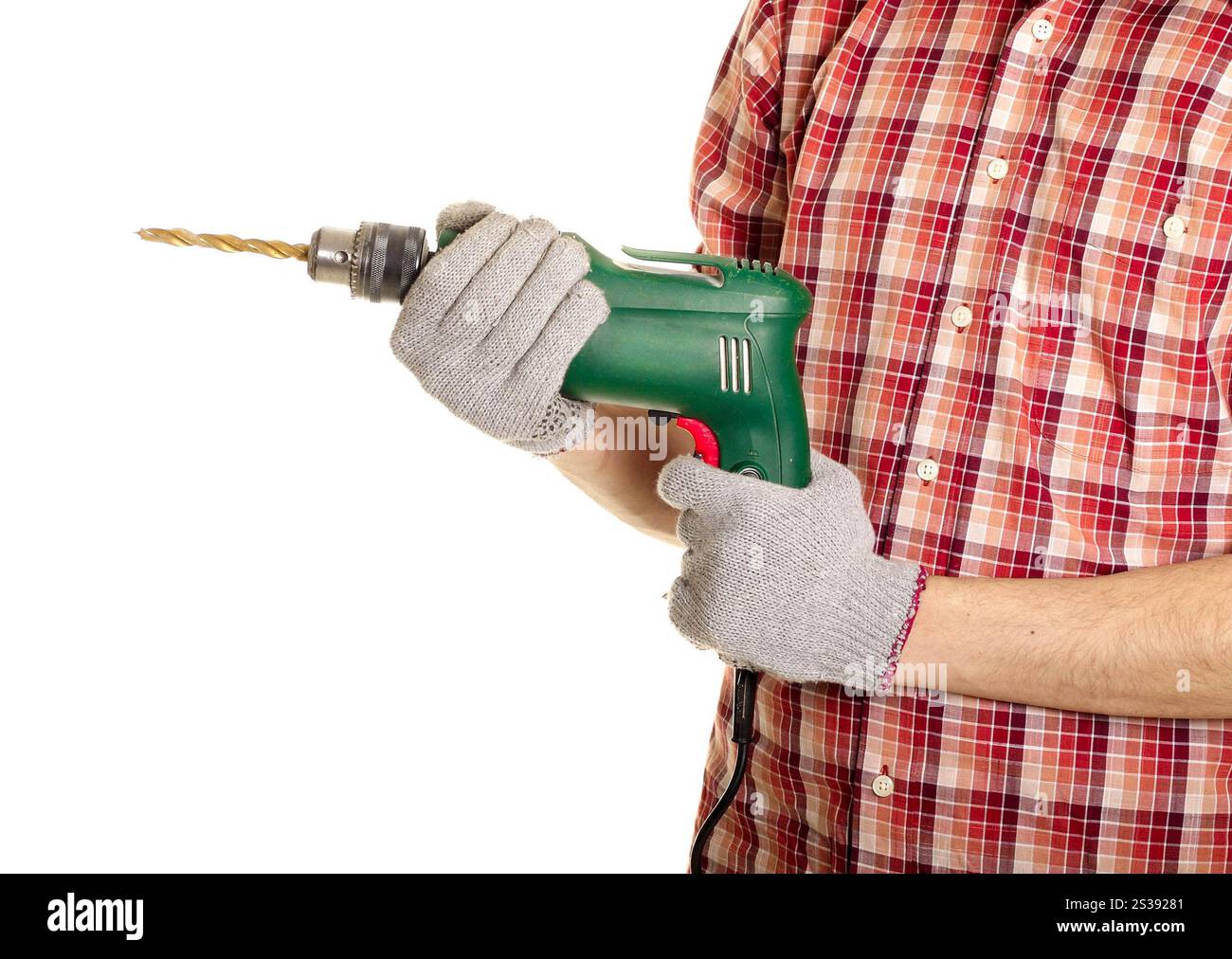 hands handling an electric drilling machine isolated on white ...