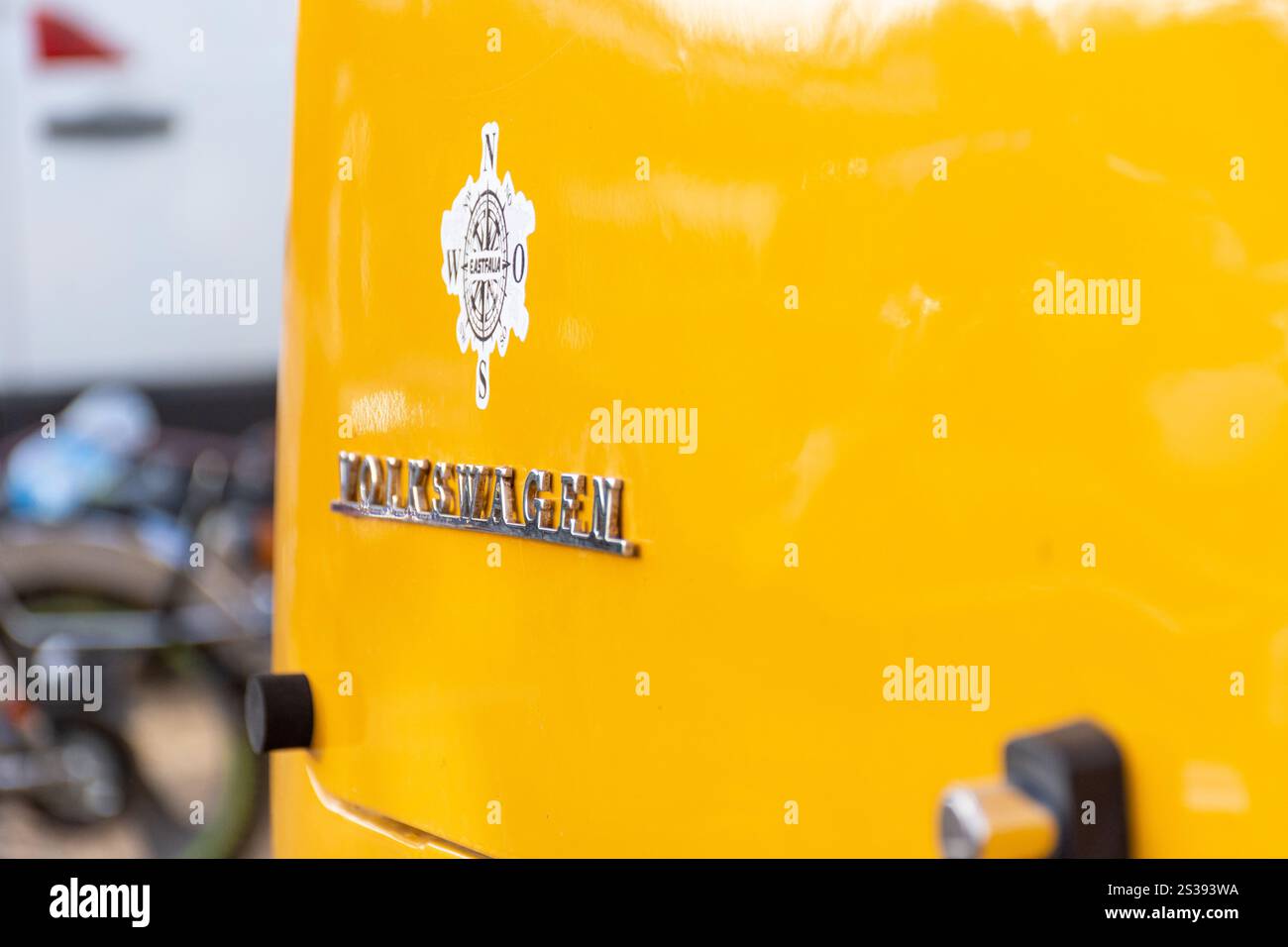 Volkswagen logo on yellow background Stock Photo - Alamy