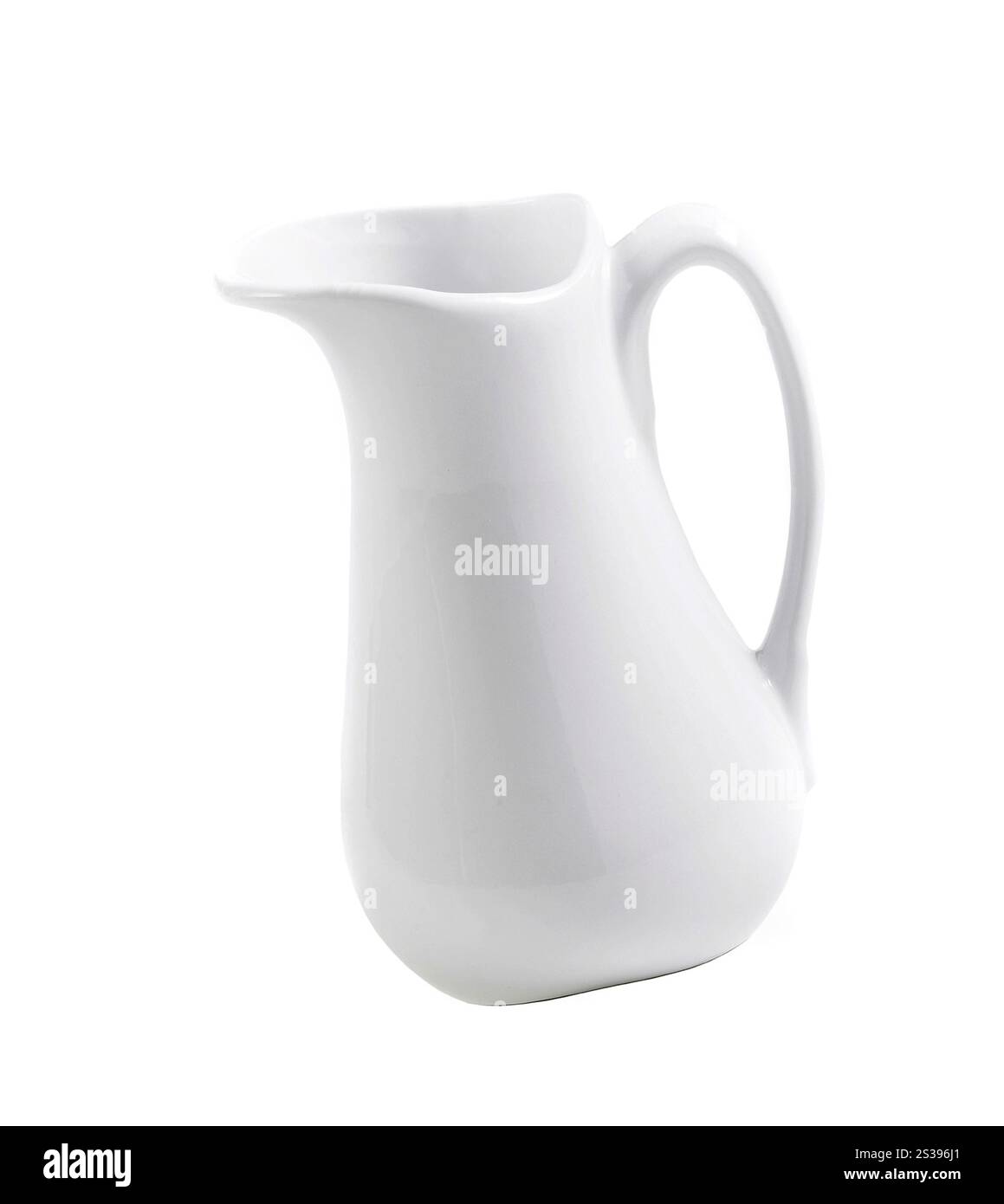 White milk pitcher isolated on white background Stock Photo - Alamy