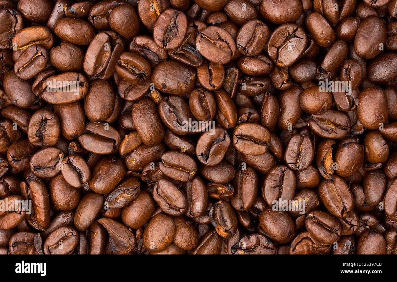 Coffee beans closeup background Stock Photo - Alamy