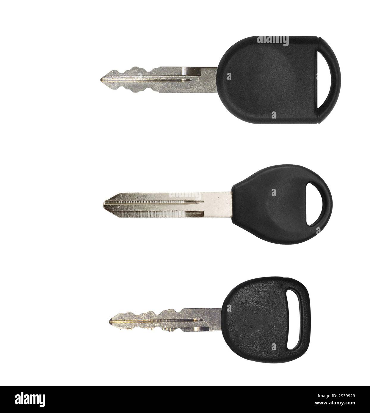 Three keys on a white background. Three keys Stock Photo - Alamy