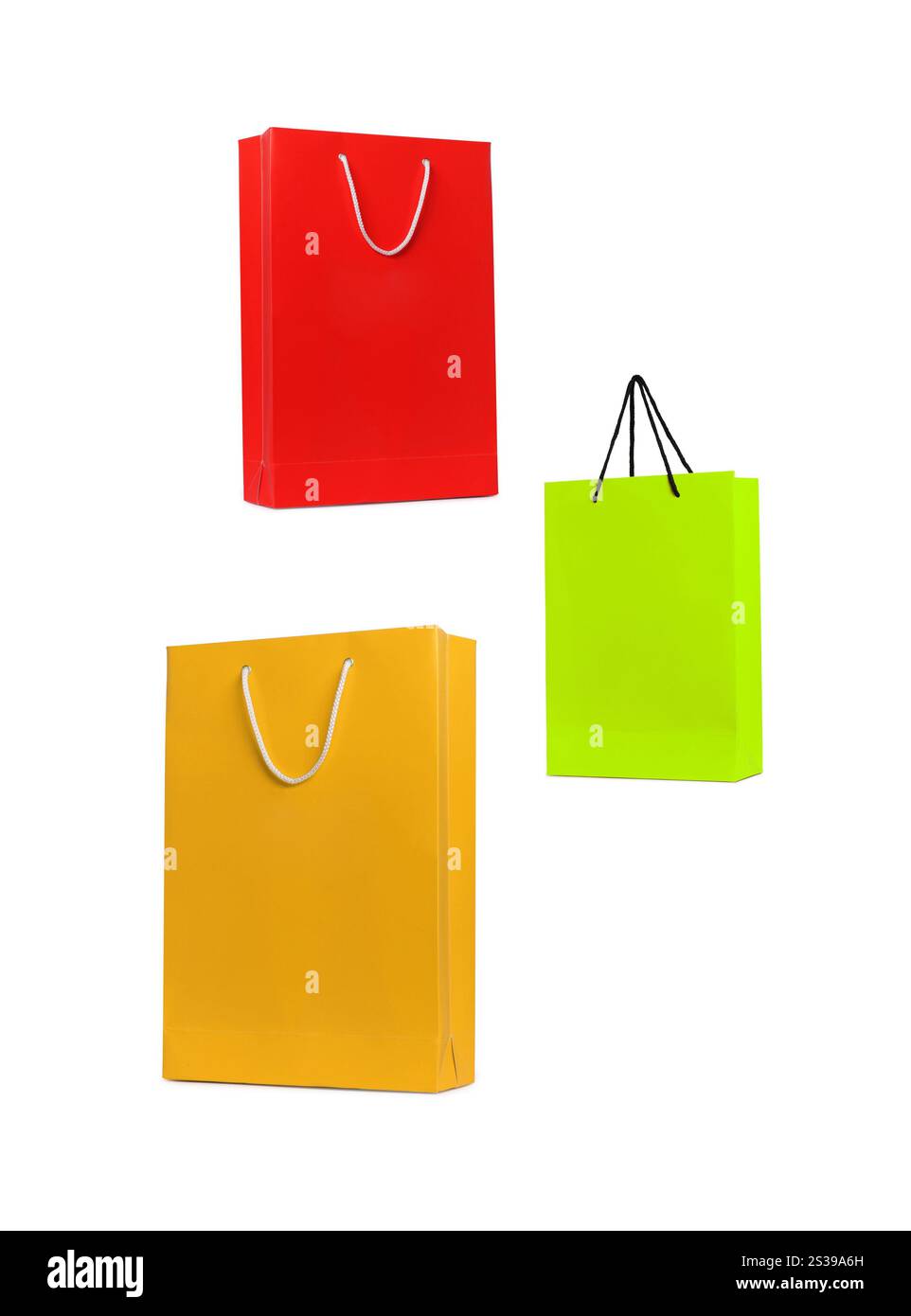 Assorted colored shopping bags on white background. Assorted colored ...