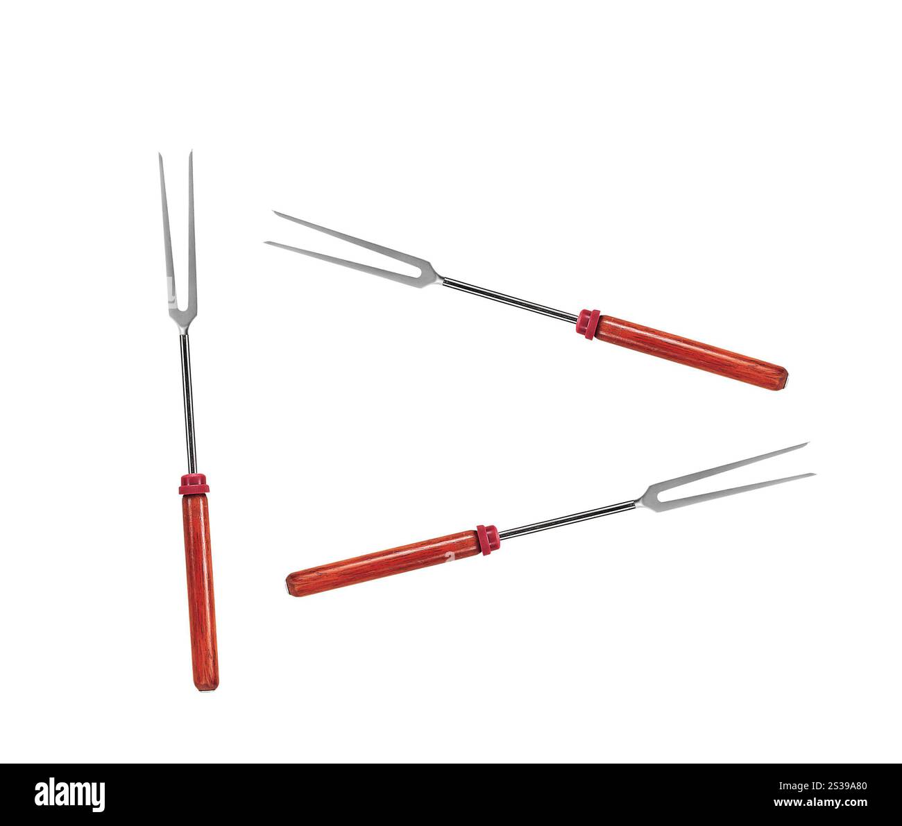 Large forks with wooden handle on a white. Large forks with wooden ...