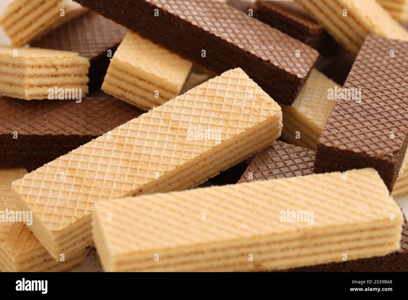 Stacked delicious chocolate wafers in large amount. Two different ...