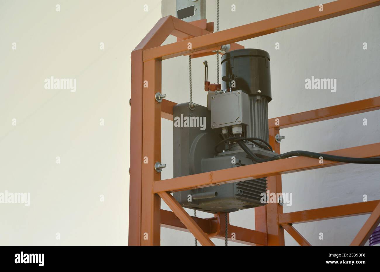 Hoist supply and safety lock as part of suspended wire rope platform ...