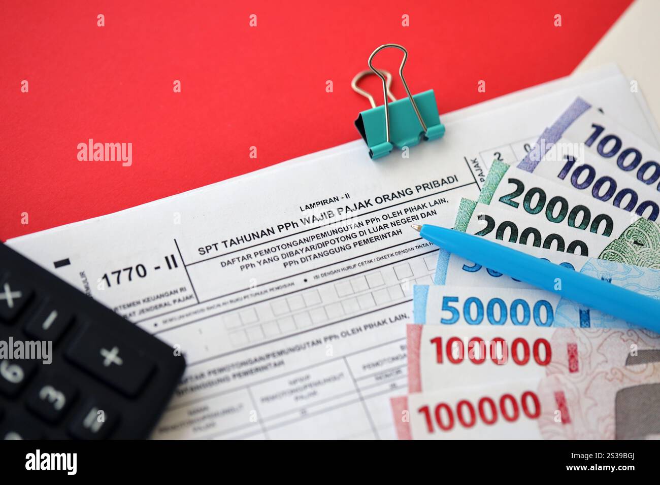 Indonesian tax form 1770-2 Individual Income Tax Return and pen on ...
