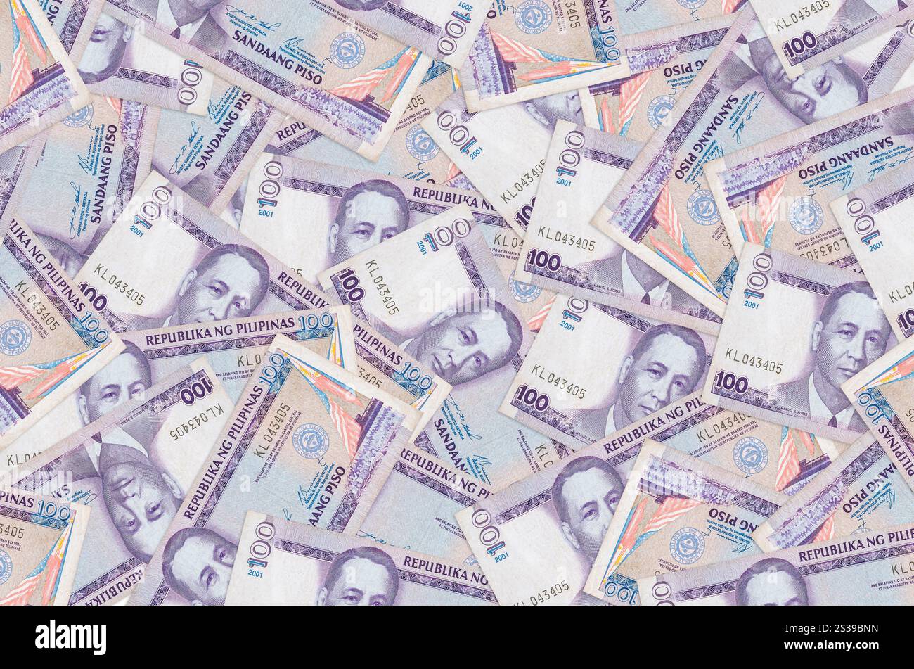 100 Philippine piso bills lies in big pile. Rich life conceptual ...
