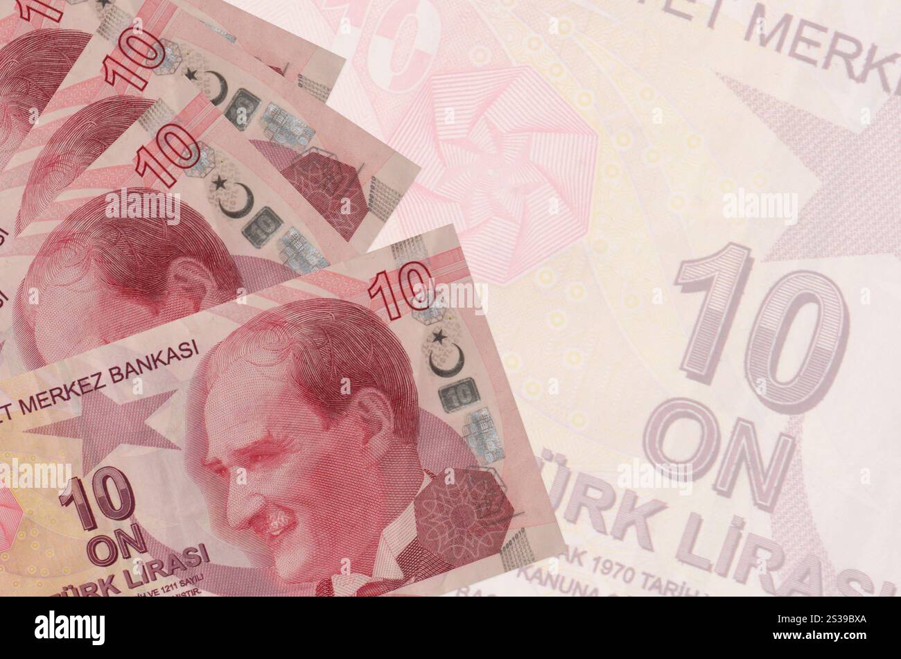 10 Turkish liras bills lies in stack on background of big semi ...