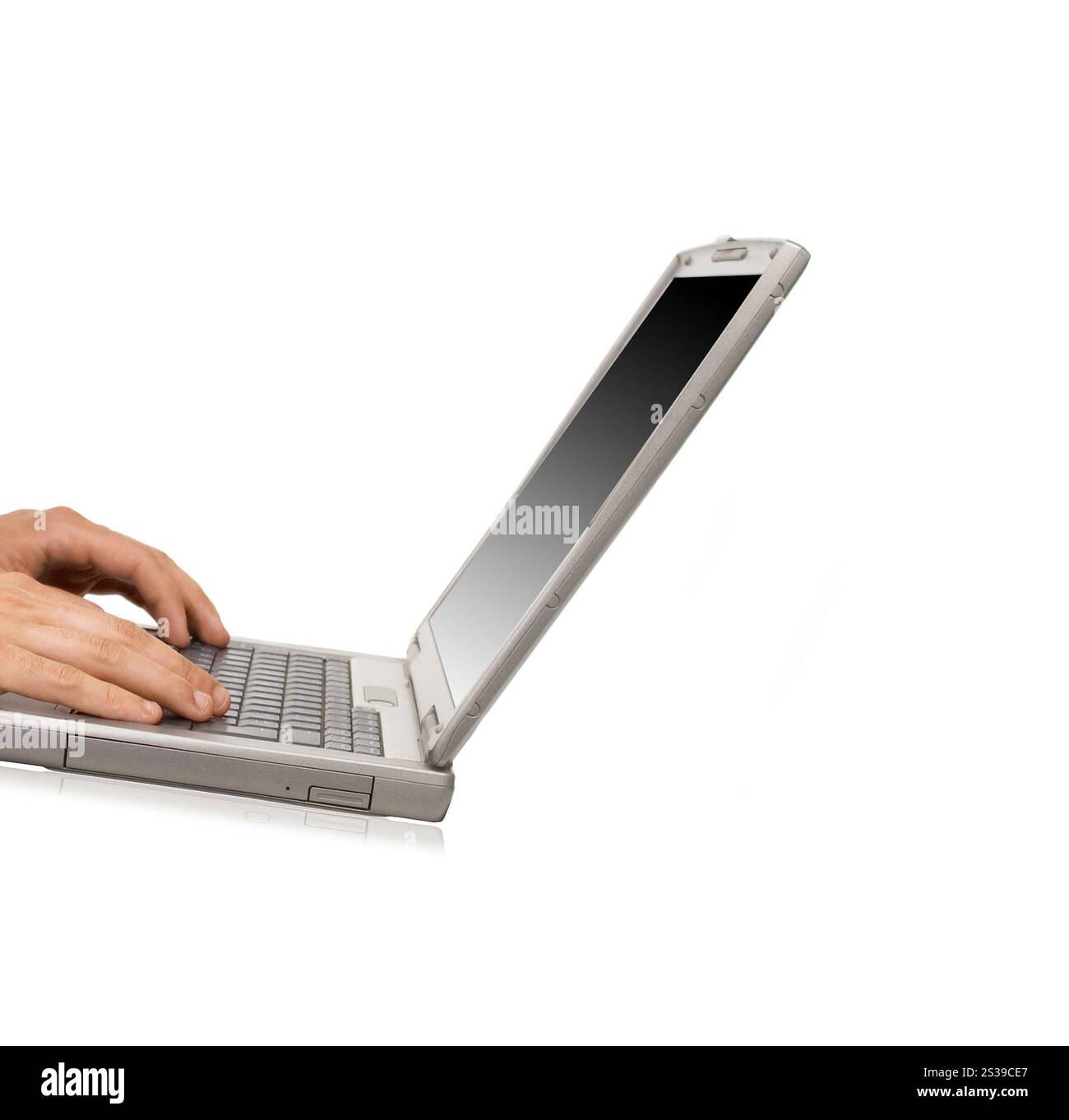 Businessman typing on a notebook isolated on white background ...