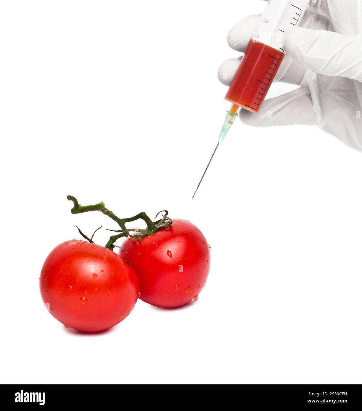 Gmo product concept: Tomato injection isolated Stock Photo - Alamy