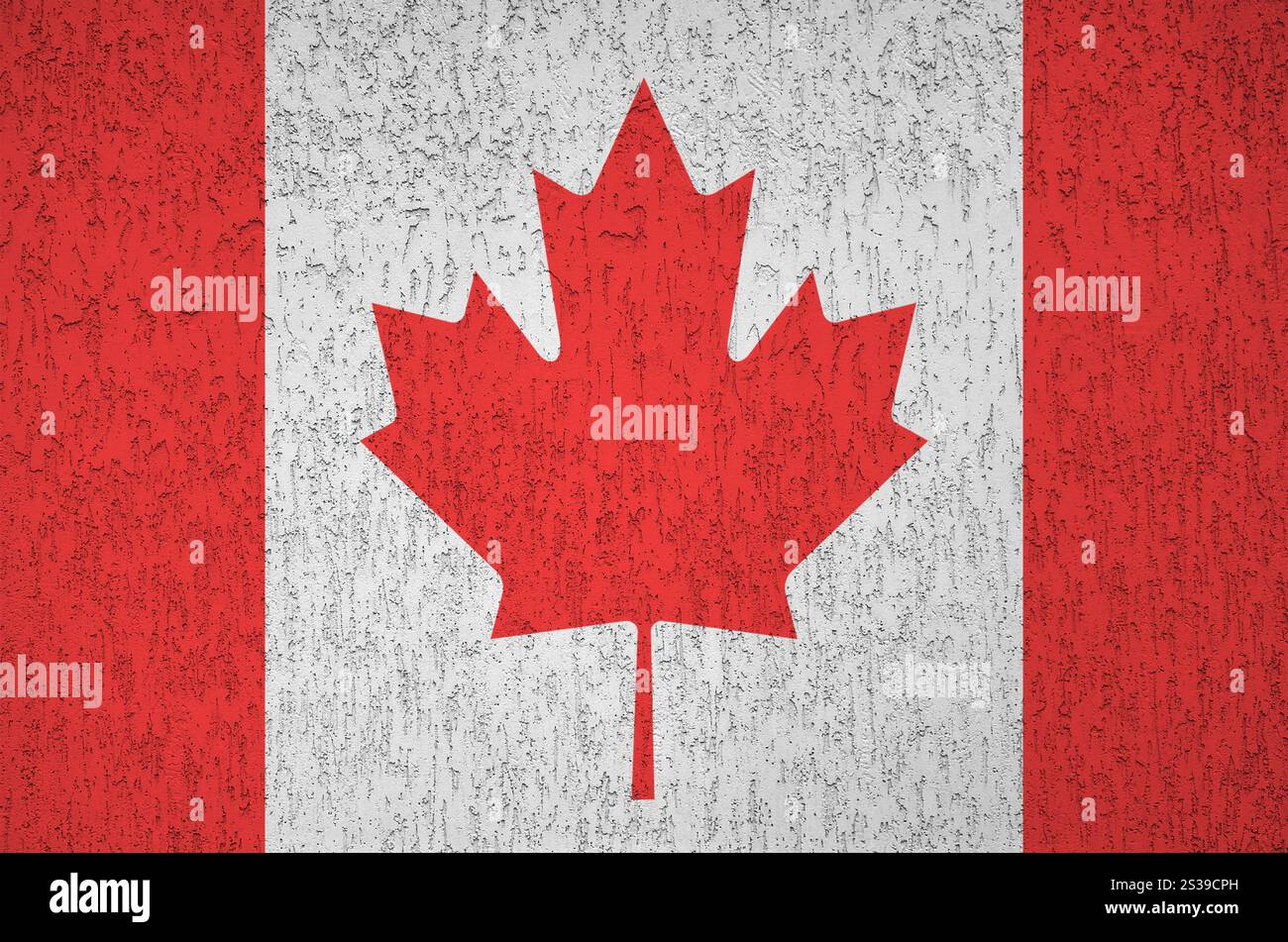 Canada flag depicted in bright paint colors on old relief plastering ...