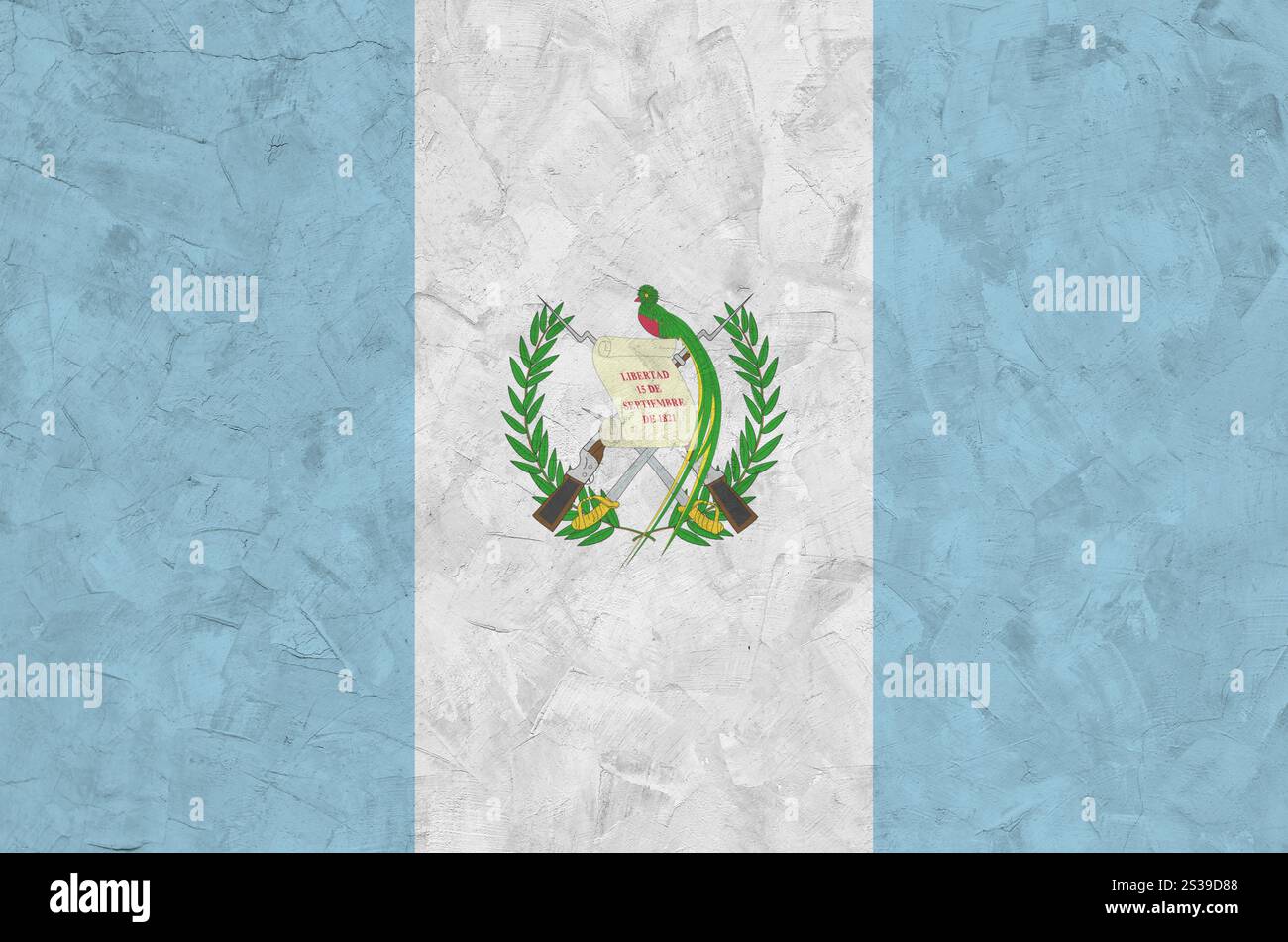 Guatemala flag depicted in bright paint colors on old relief plastering ...