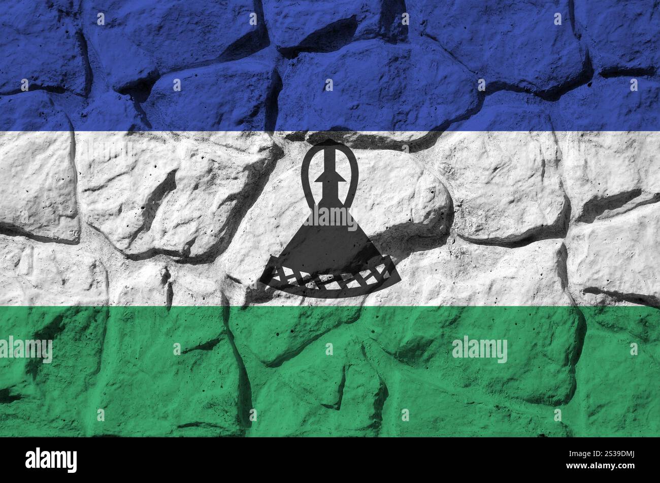Lesotho flag depicted in paint colors on old stone wall close up ...