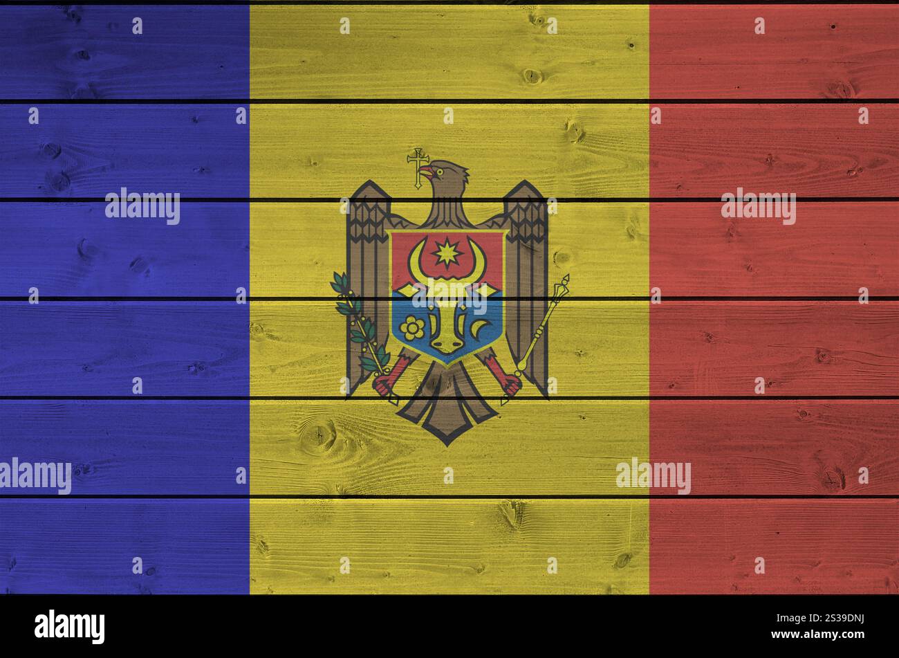 Moldova flag depicted in bright paint colors on old wooden wall close ...