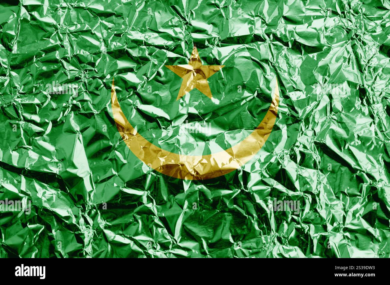 Mauritania flag depicted in paint colors on shiny crumpled aluminium ...